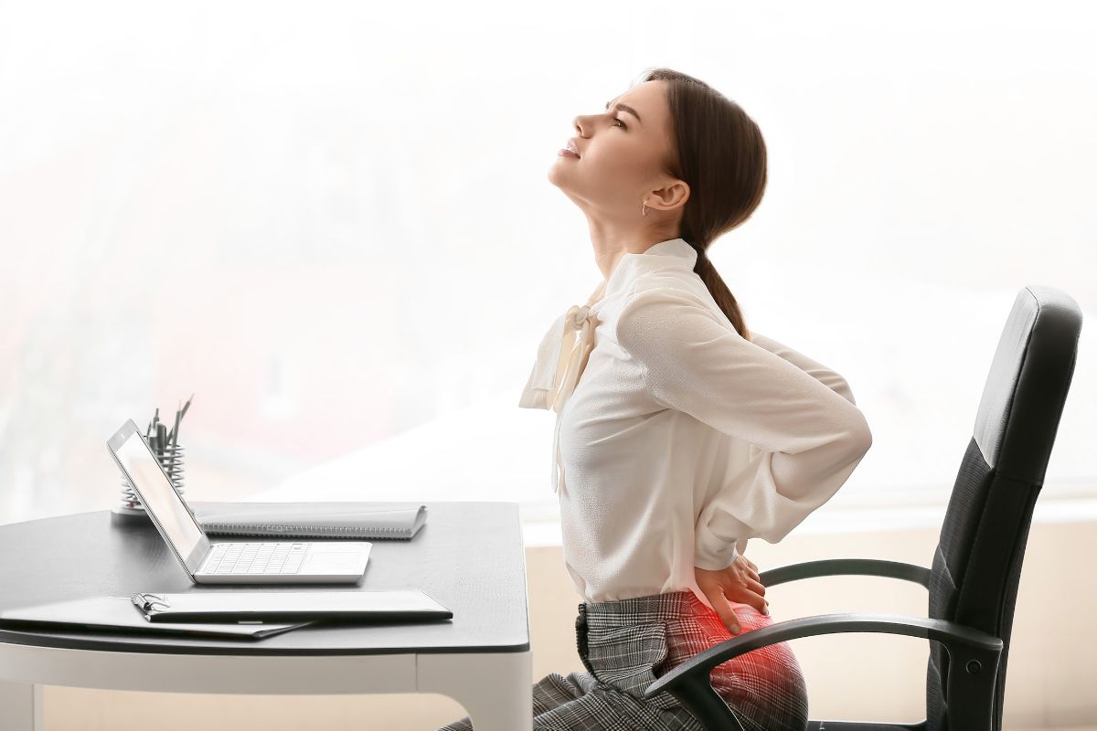 Lower Back Pain: Causes & Solutions for Pain When Sitting or Bending